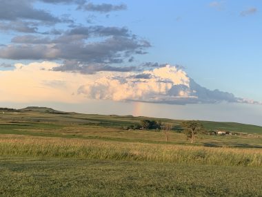 Rainbow at Crown Butte Hill - SkySpy Photos, Images, Video