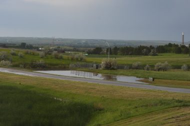 Ditch full and running over road during storm - SkySpy Photos, Images ...